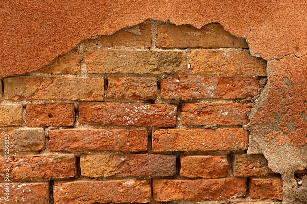 Muro de ladrillo de barro viejo. Stock Photo | Adobe Stock