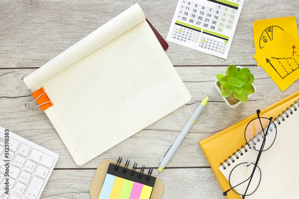 Yellow notepaper for notes, paper for notes on the desktop. a schedule ...