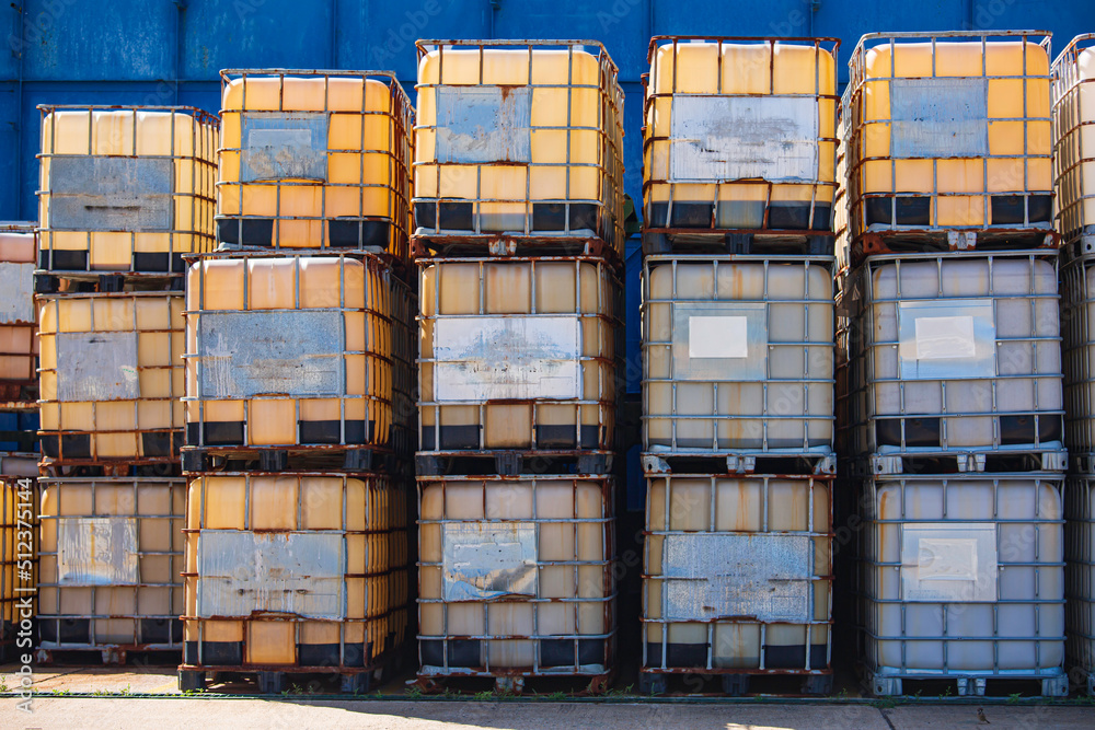 White square water tank. Water tank with a metal grate. White huge ...