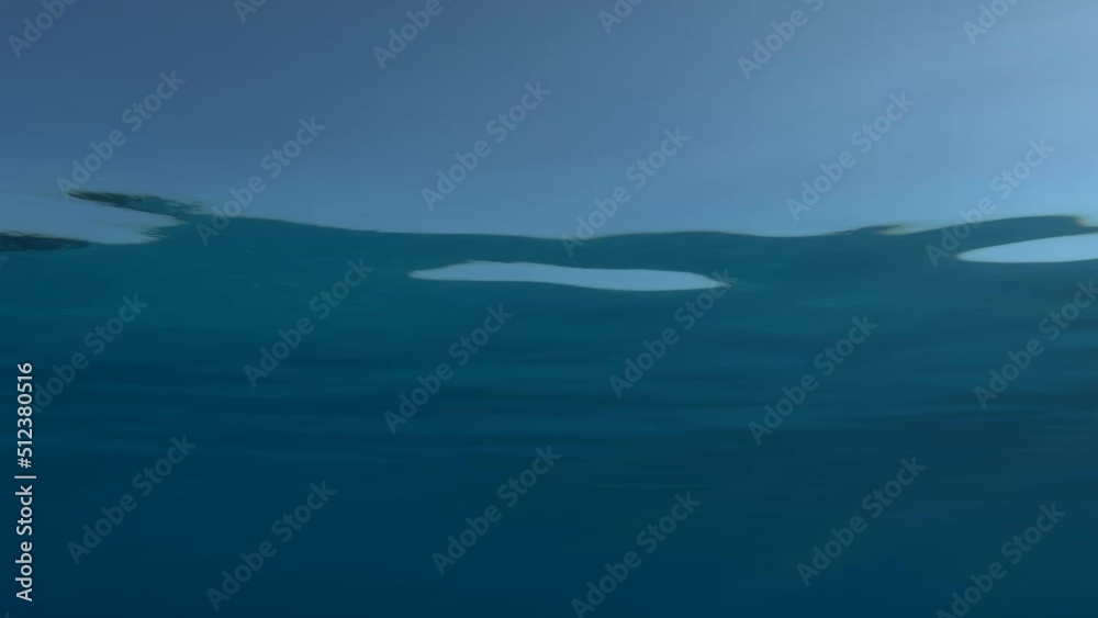 Underwater shot, surface of blue water with sun rays. Natural ...