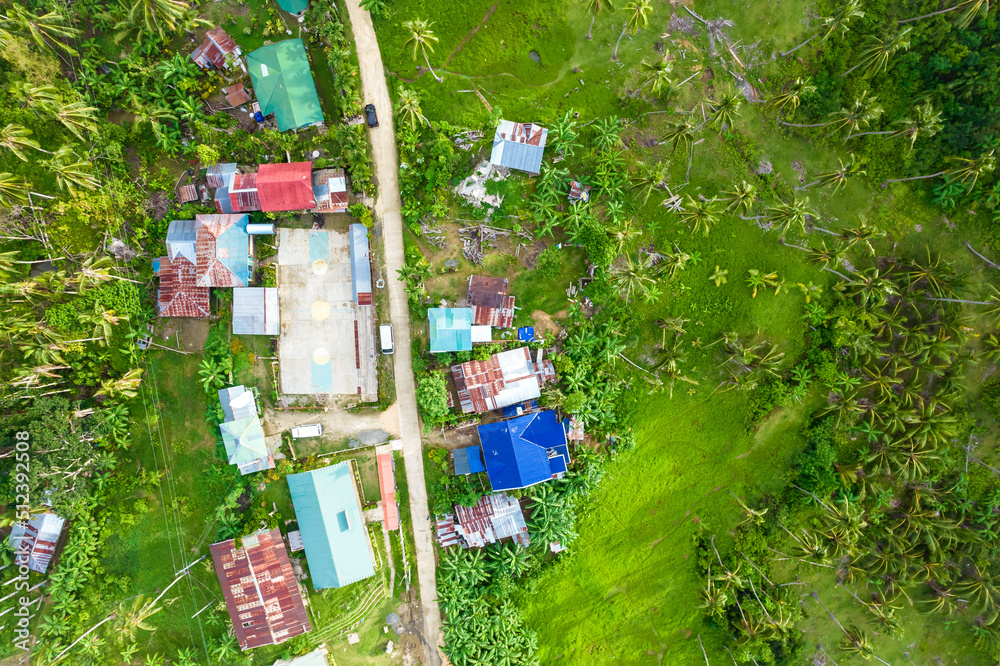 Top view of a small village composed of a few houses and a central open ...