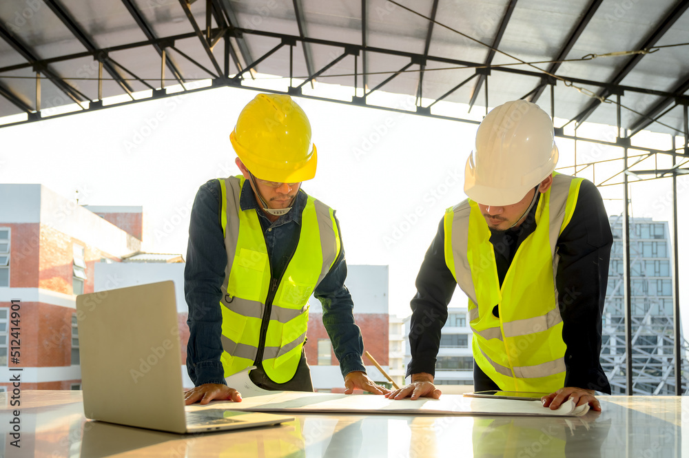 Civil Engineer and Construction Supervisor inspect the internal ...