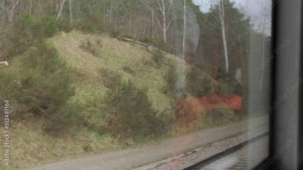 View on railroad track from the window of fast train. 4K Interior view ...