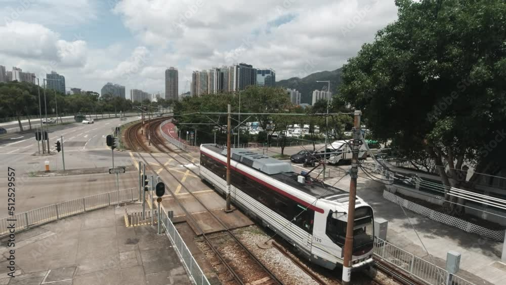 An aerial view of light train. Light rail system operated by MTR ...