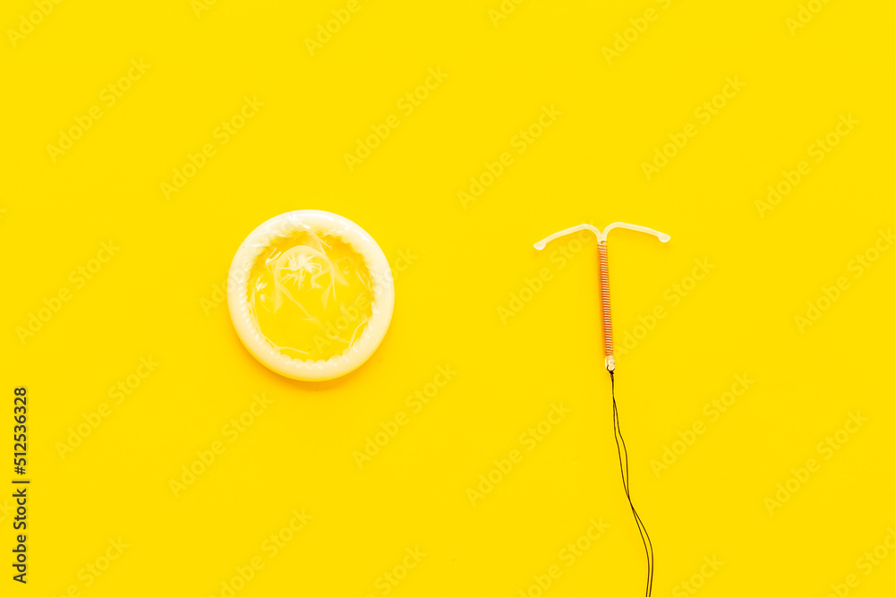 T-shaped intrauterine birth control device with condoms. Contraception ...