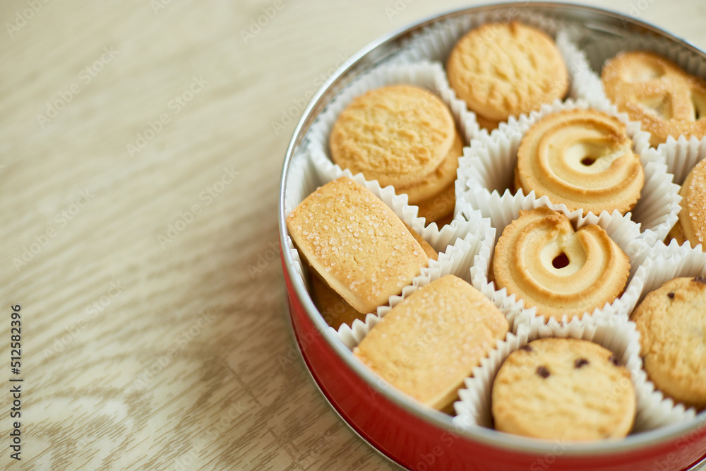 Top view tasty danish butter cookies in a tin box , set of crispy ...