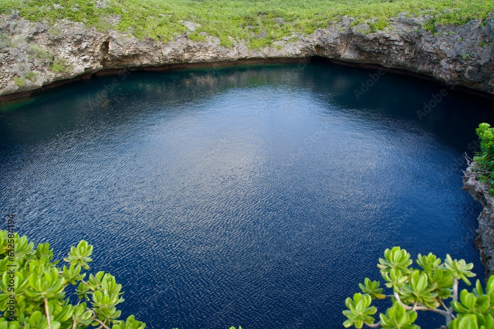 Large hole called "Toriike pond" created by limestone erosion Stock ...