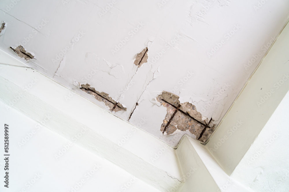 Water damaged ceiling roof in an old house. Water damage building ...