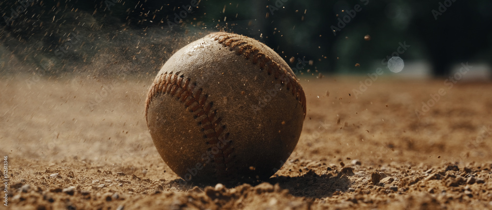 Dust in motion with baseball ball closeup on game field dirt. Stock ...