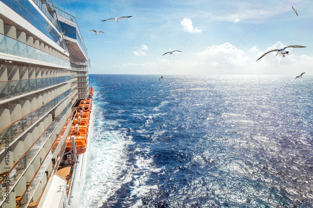 Ocean view from a cruise ship deck on a bright day with seagulls Stock ...