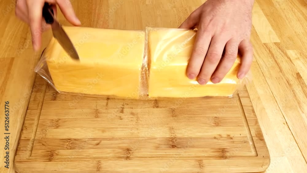 Separating sandwich cheese singles from large pack to be sorted into ...