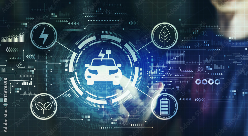 EV concept with young man touching a digital screen at night Stock ...