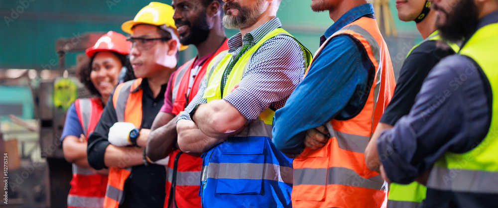 Arms crossed. Professional team working at workplace. Unity and ...