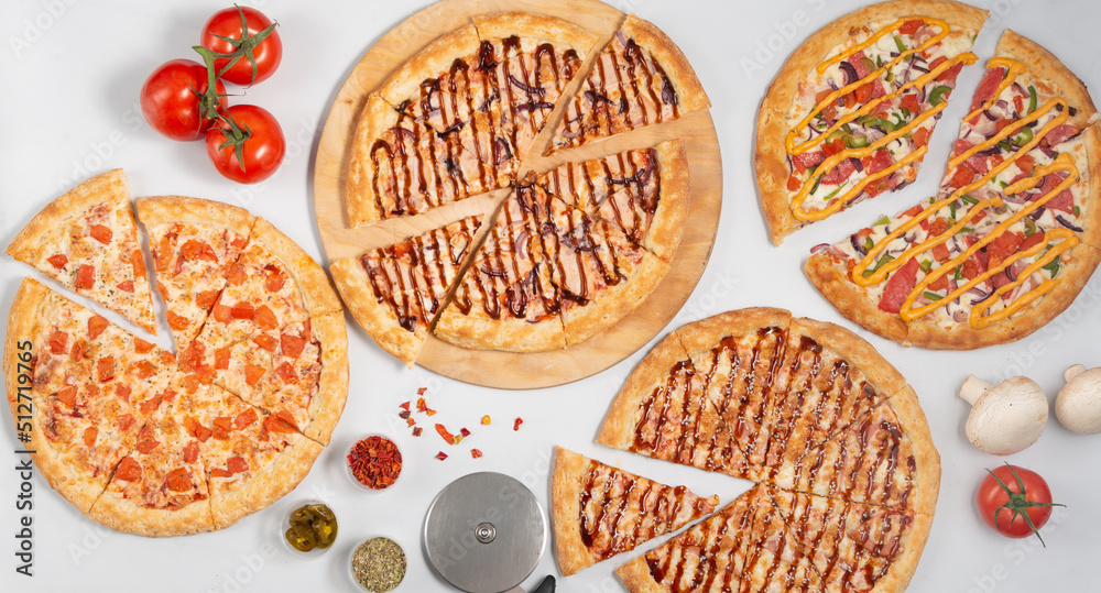 different types of pizza on a white background, a composition of ...