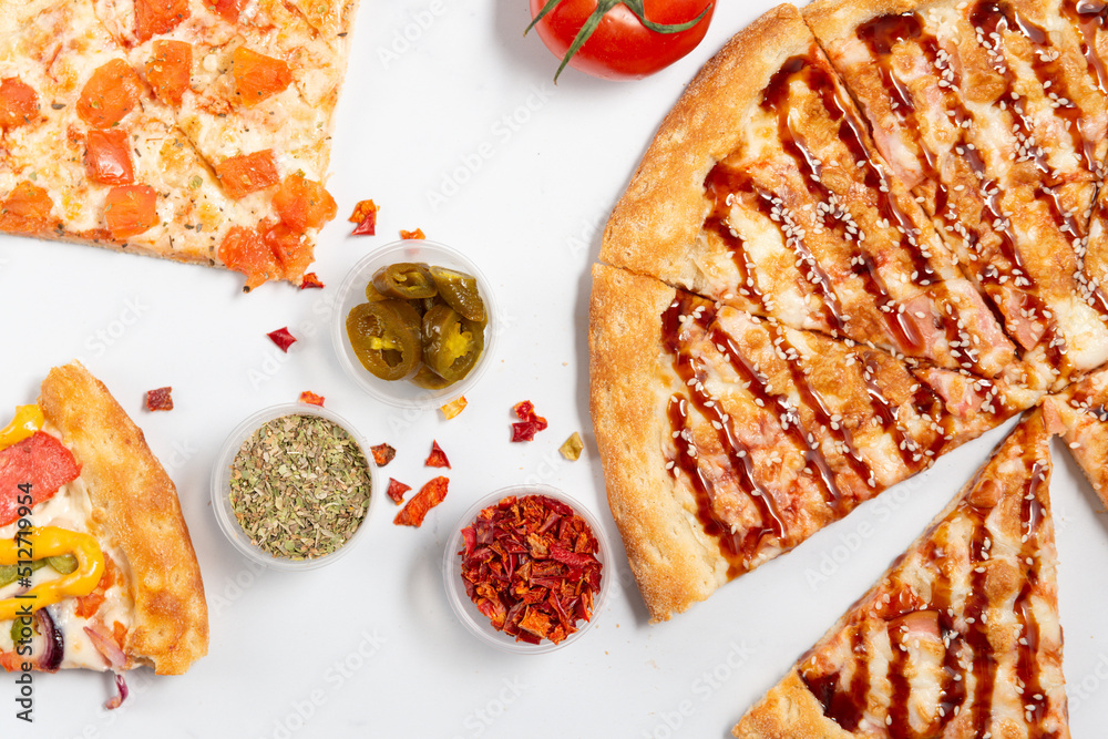 different types of pizza on a white background, a composition of ...