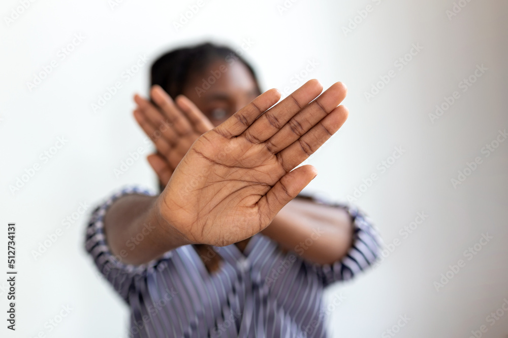 Woman defending herself from attack. Stop. Hands outstretched. campaign ...