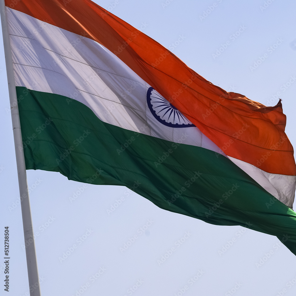 India flag flying high at Connaught Place with pride in blue sky, India ...