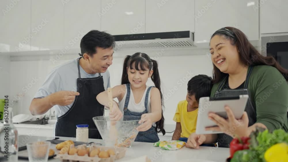 Happy family mom dad and kids siblings cooking together, parents ...