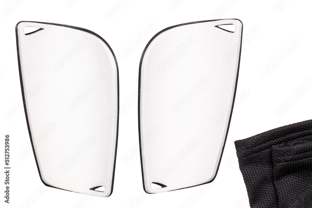 Football protection of the feet. Close-up of a pair of silver-grey ...