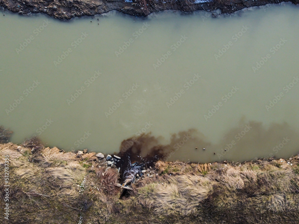Polluted river. Hazardous chemicals are released into the river ...