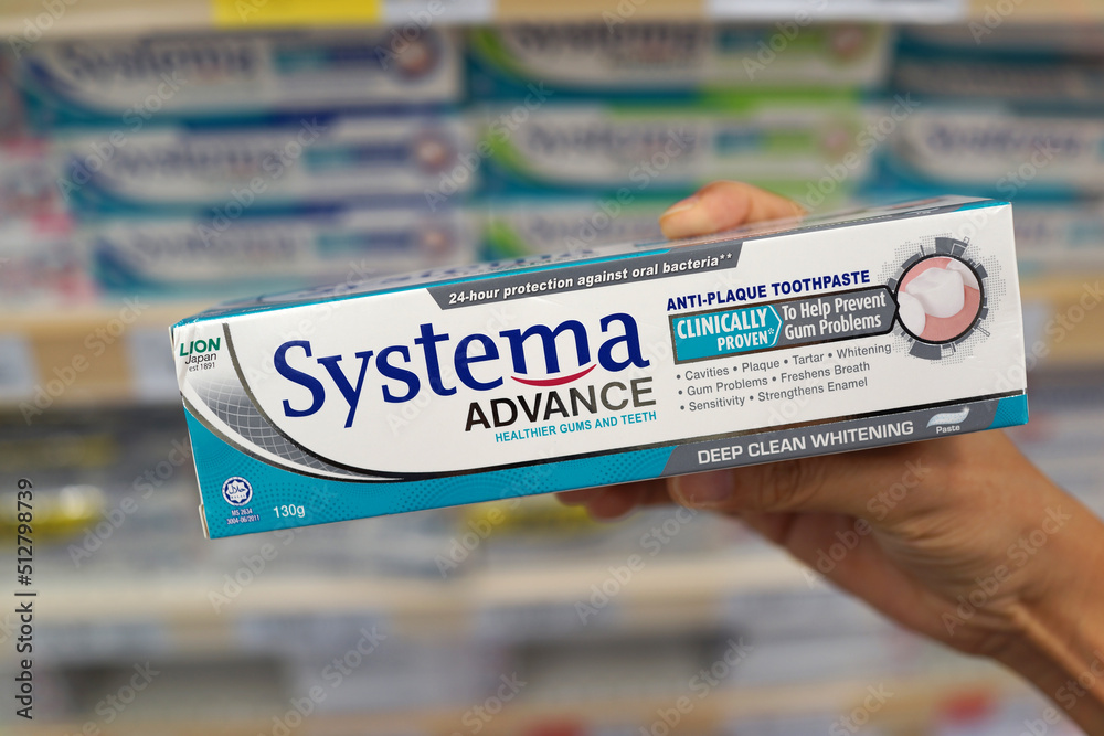 PENANG, MALAYSIA - 14 JUNE 2022: Consumer hand holding a Systema brand ...