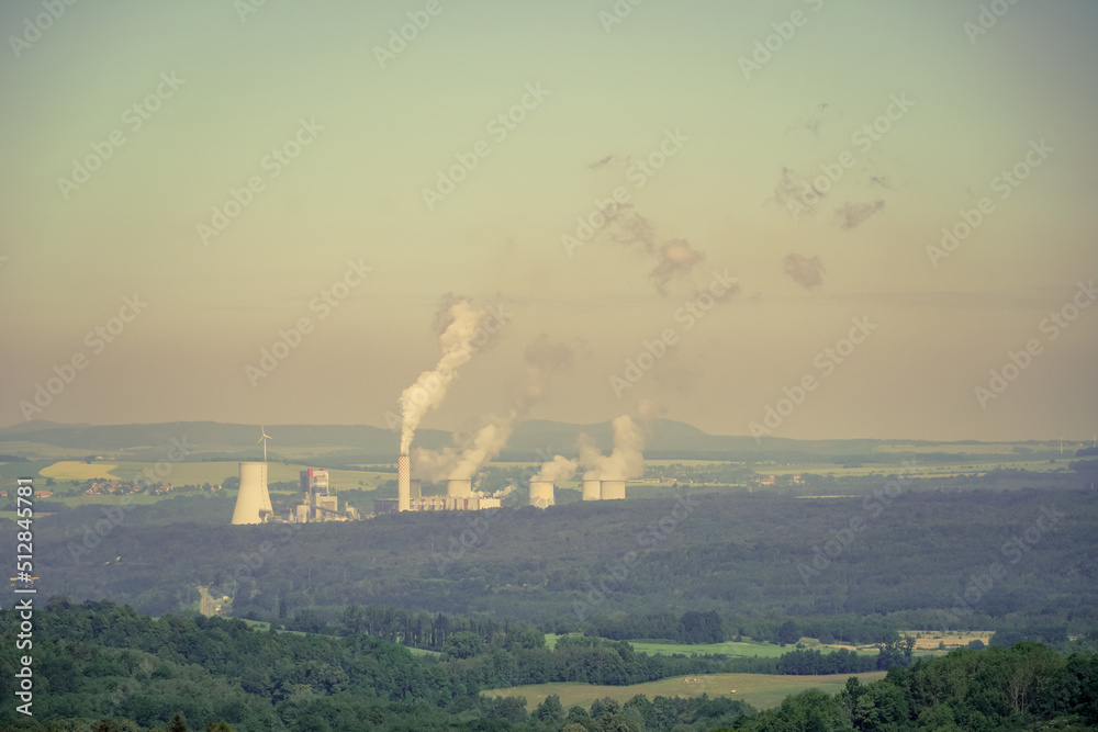Poster Coal energy, fossil fuel power generation behind the rows of ...