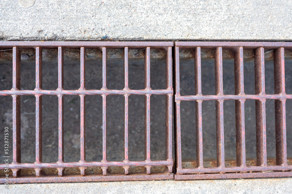 Grate over a stormwater trench in a concrete slab. Stock Photo | Adobe ...