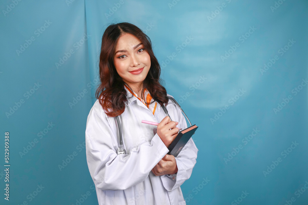 Portrait of a young Asian woman doctor, a medical professional is ...
