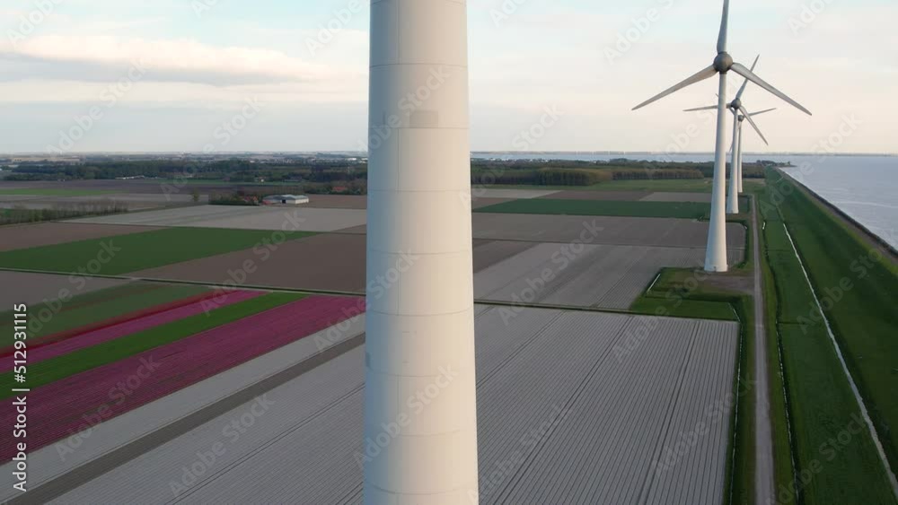 Wind turbines aerial view. Working offshore wind farm, sunset cinematic ...