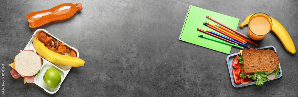 Flat lay composition with lunch box and tasty food for school on grey ...