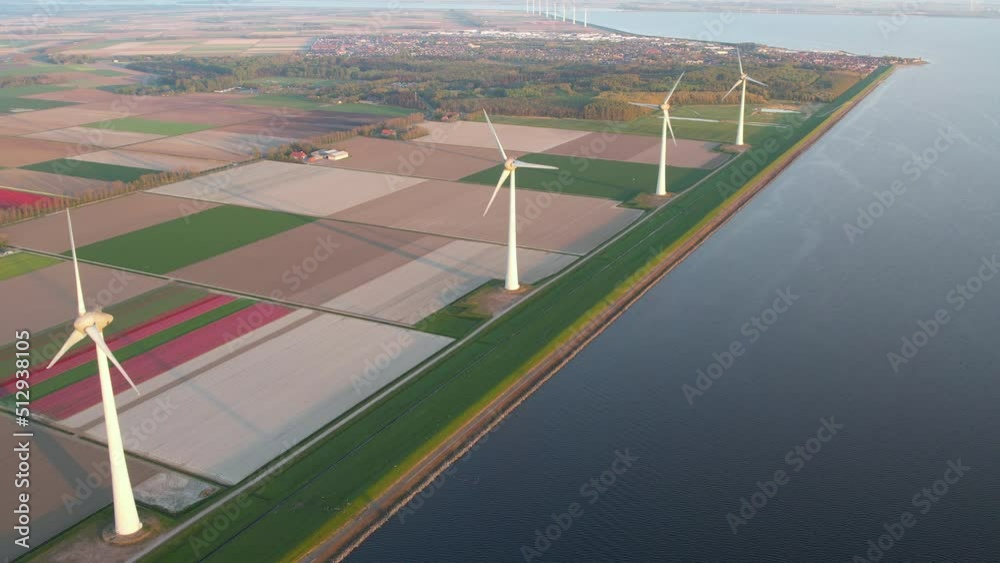 Wind turbines aerial view. Working offshore wind farm, sunset cinematic ...