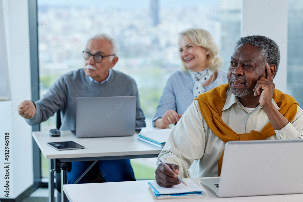 Fotografia do Stock: A multicultural senior student is following ...