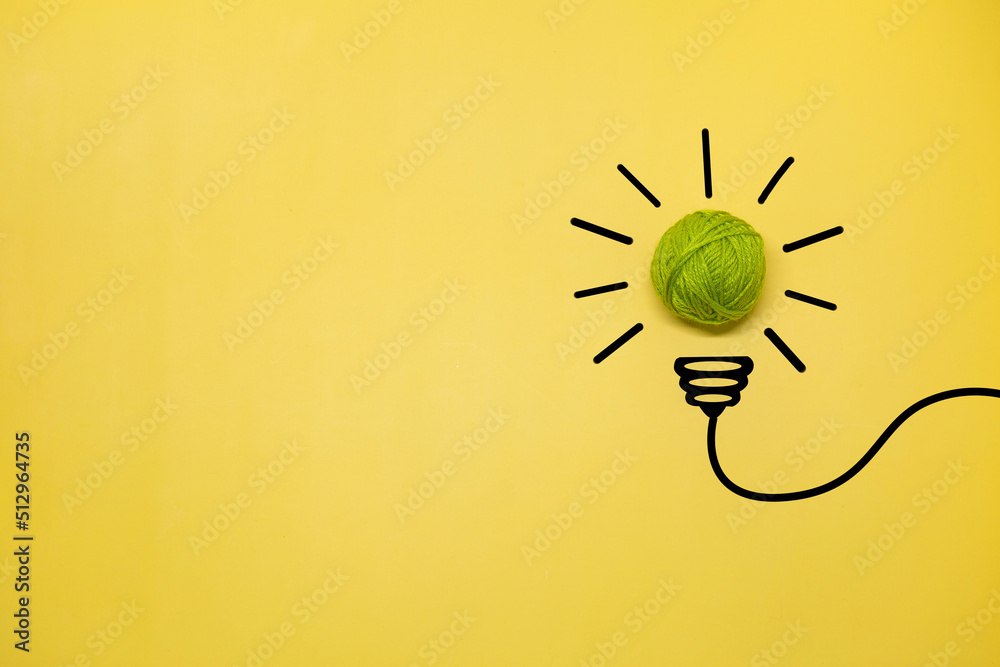 Creative thinking ideas and innovation concept. A ball of green threads ...