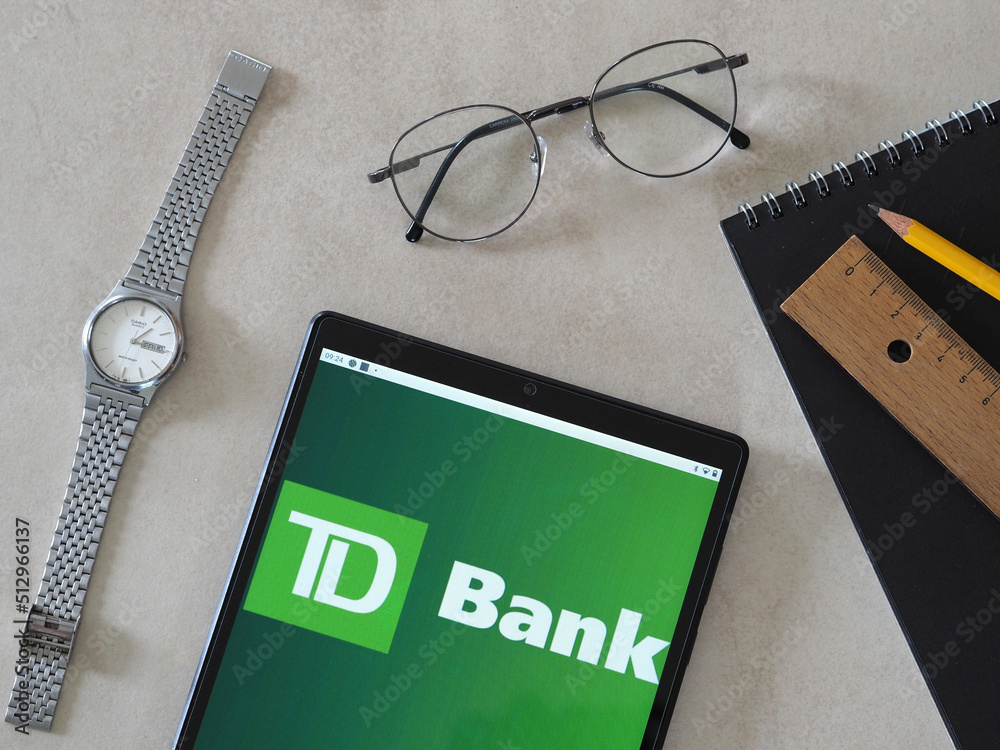 In this photo illustration TD Bank logo seen displayed on a tablet ...