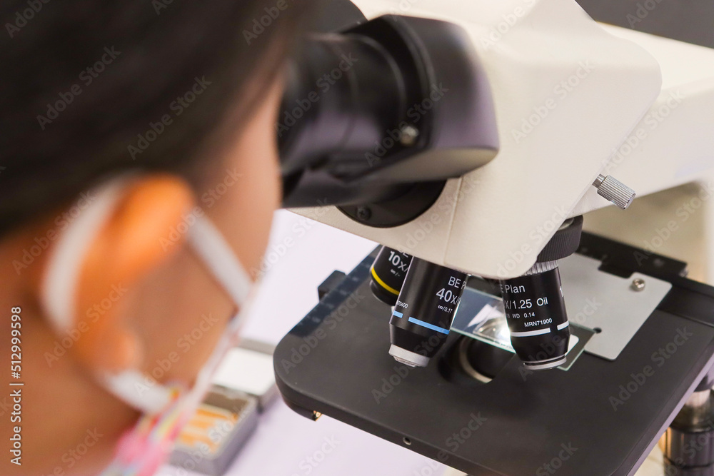 microscope on the background of the laboratory Stock Photo | Adobe Stock