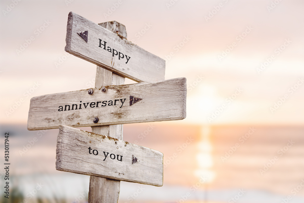 happy anniversary to you text quote on wooden crossroad signpost ...