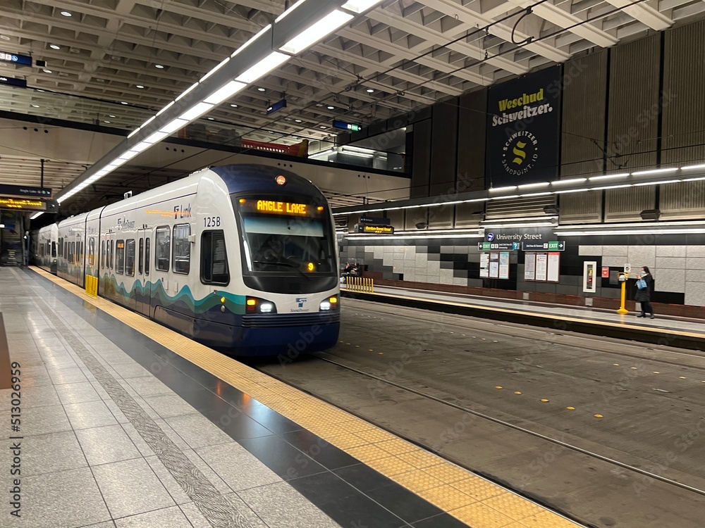 SEATTLE, WA, DEC 2021: modern train pulling into University Street ...