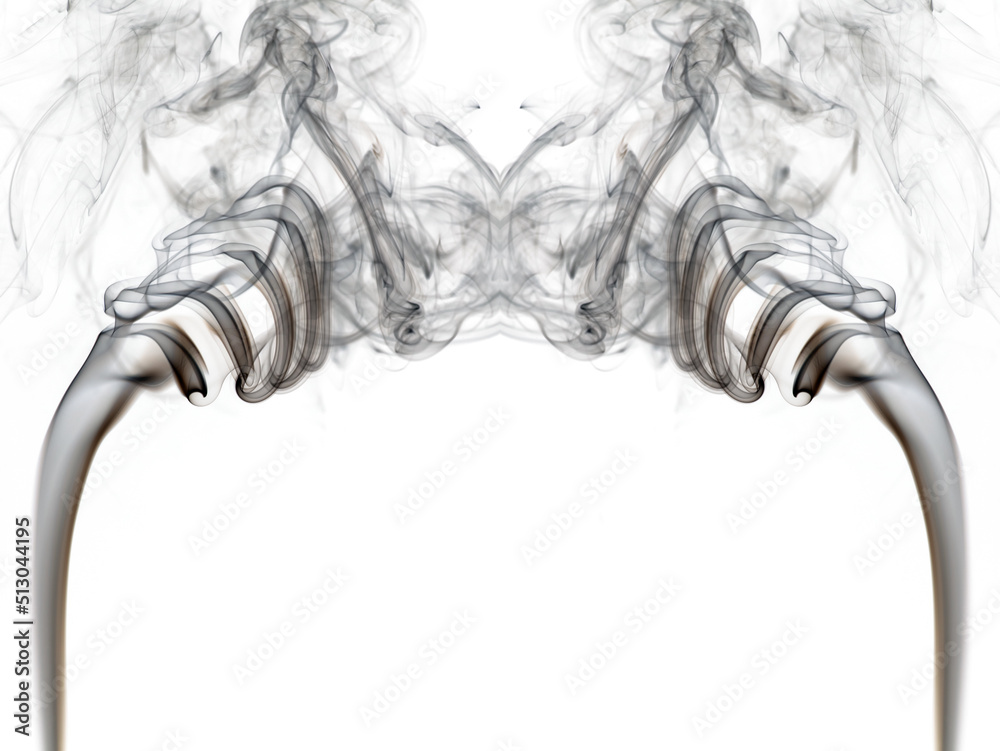 Puffs and curls of dark smoke on a white background rising from a ...