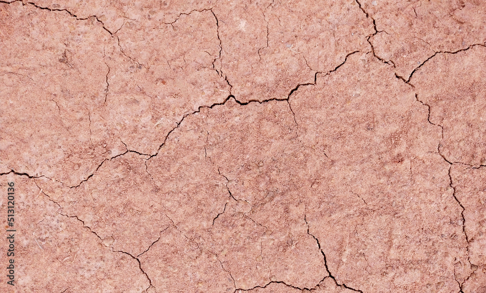 Cracked ground background in the top view for graphic design or ...