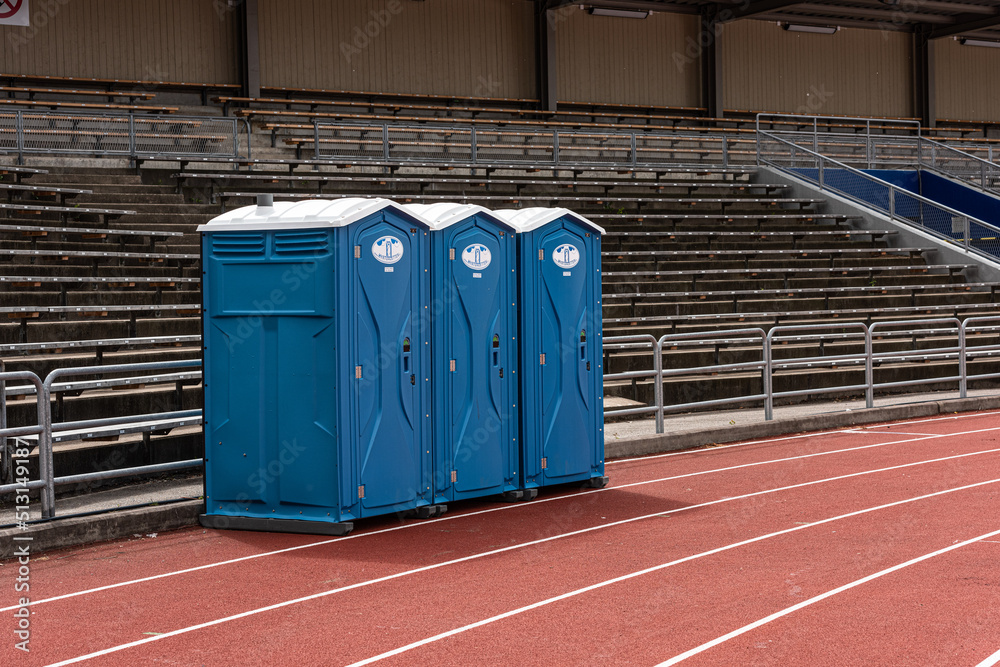 Gothenburg, Sweden - May 22 2022: Three blue portable toilets at a ...