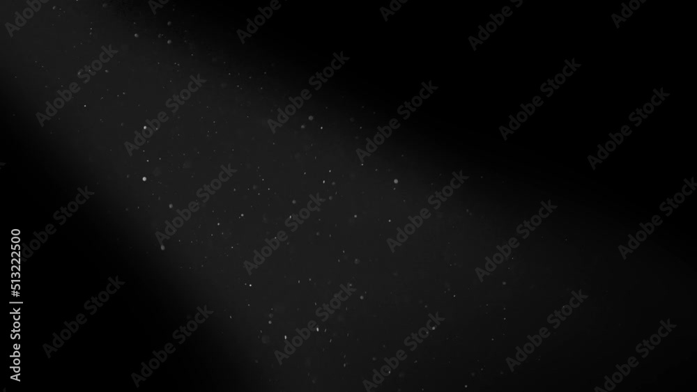 Dust particles in a light beam ray filmed with RED camera in 4K in slow ...