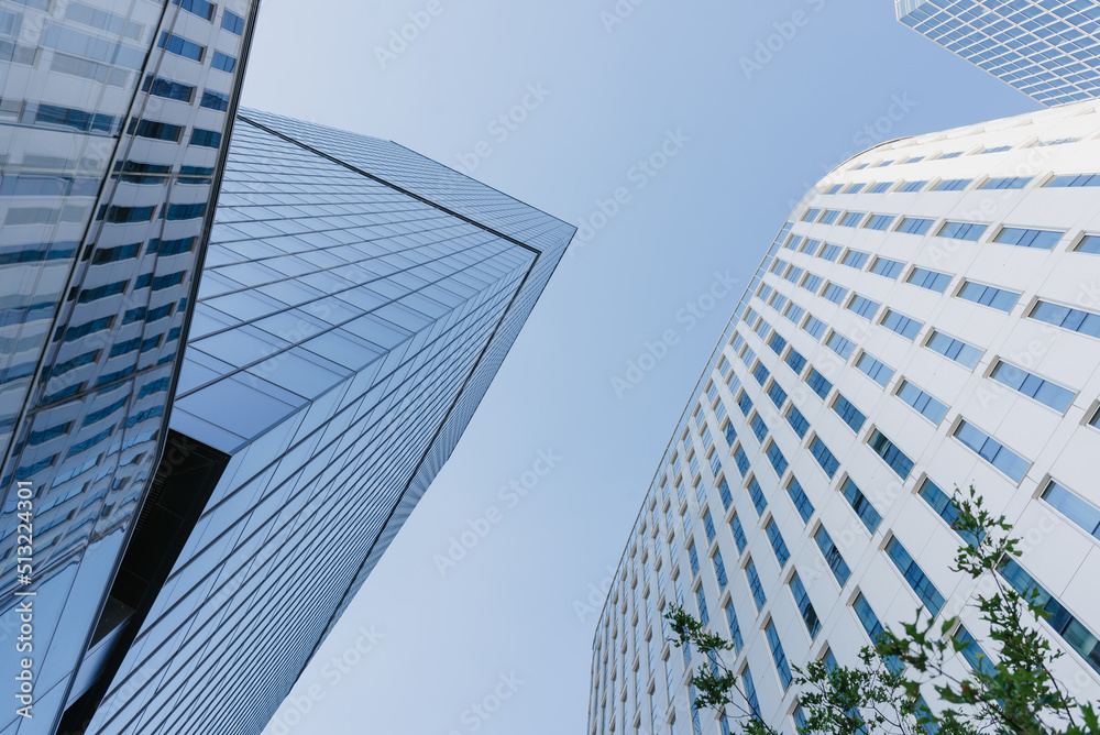 The view of the sky between skyscrapers at noon. Modern office ...