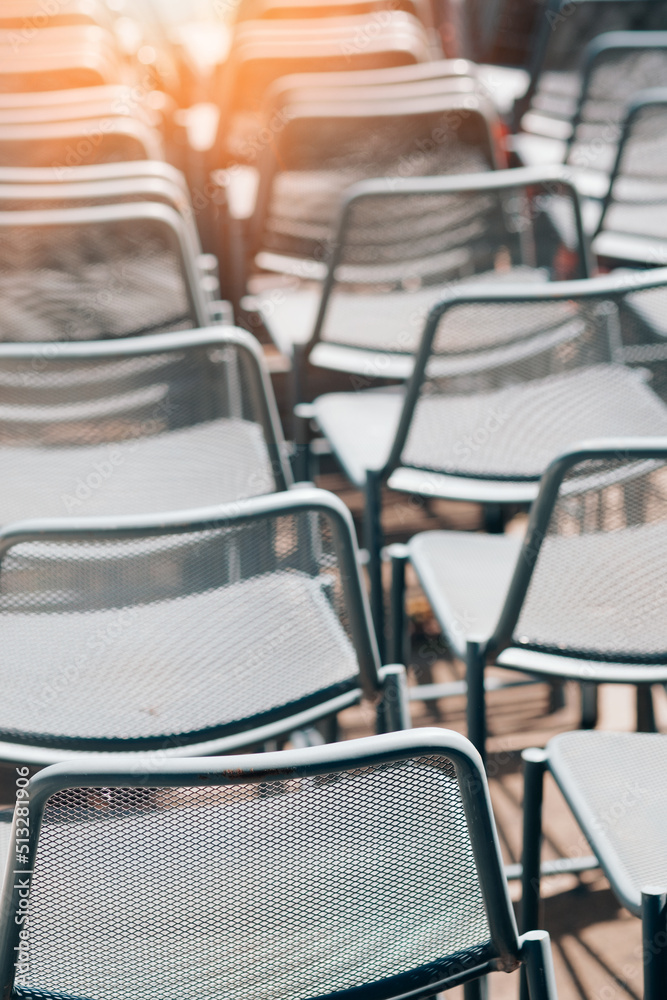 One chair standing out from the crowd. A metaphor for chosen one among ...