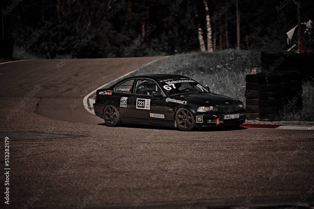25-06-2022 Riga, Latvia Race driver on track going in to corner Stock ...