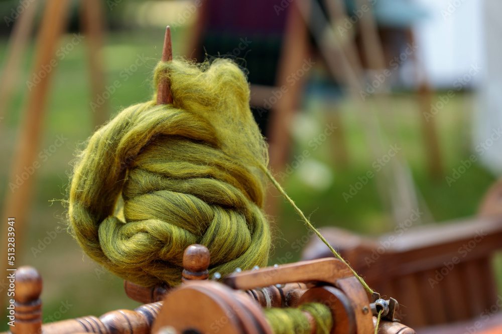 Medieval spinning wheel Stock Photo | Adobe Stock