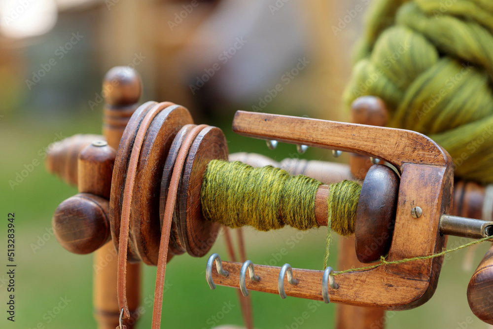 Medieval spinning wheel Stock Photo | Adobe Stock