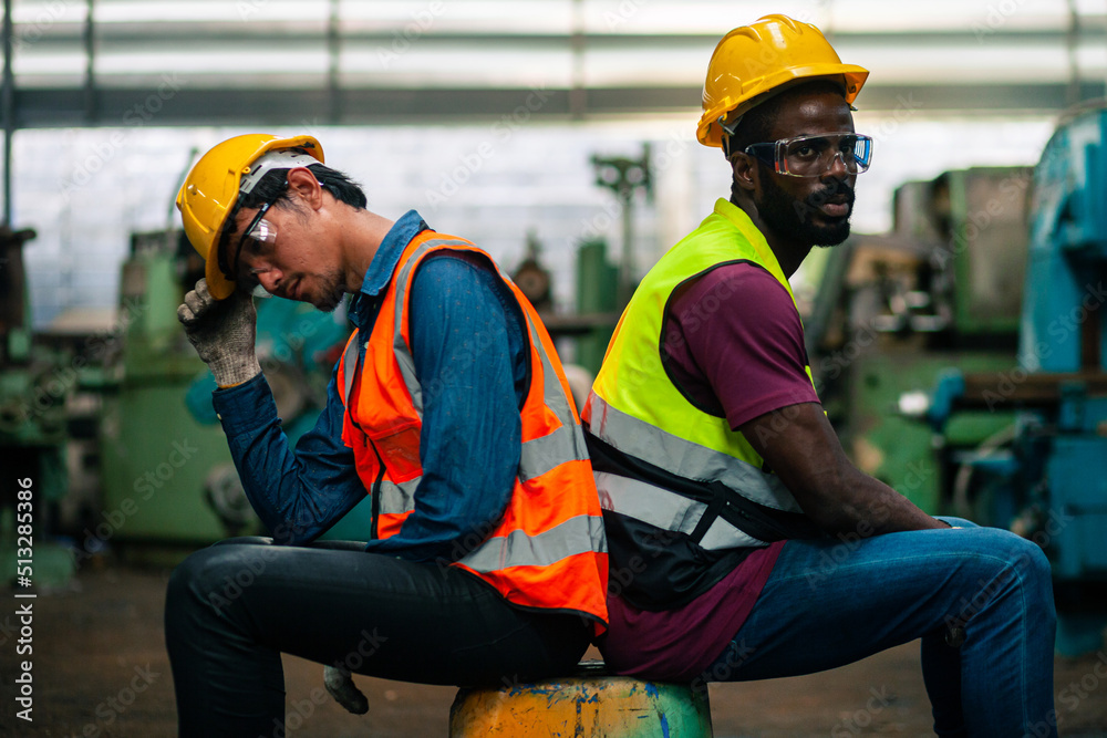 workers or technicians in an industrial plant. Feeling stressed and ...