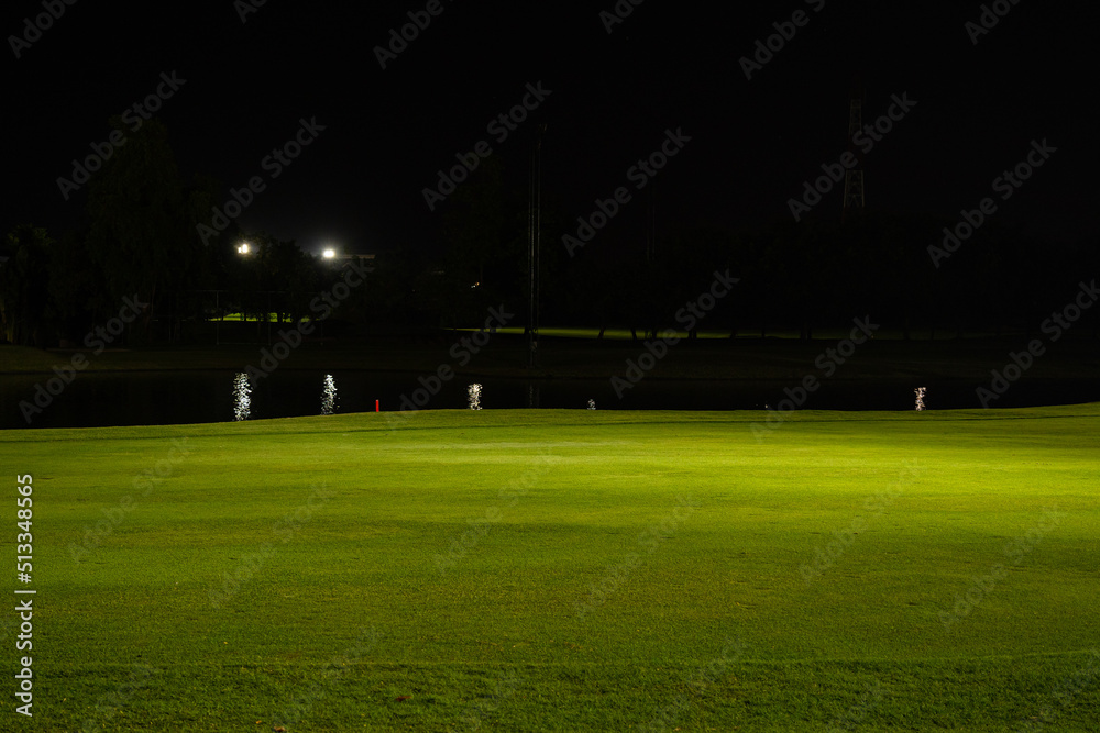 Beautiful dark night view of the golf course, Bunkers sand and green ...