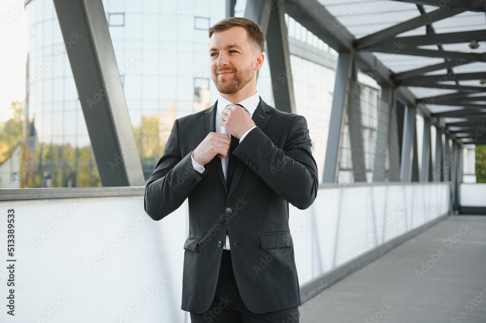 Stockbroker near the office. A successful and advanced handsome ...