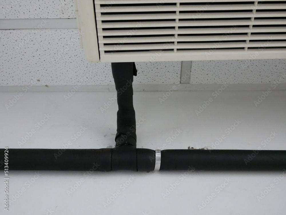 air conditioning duct connected to fan coil unit of air conditioner in ...